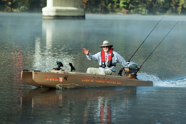 Wavewalk 700 with an outboard gas motor, and with an electric trolling ...