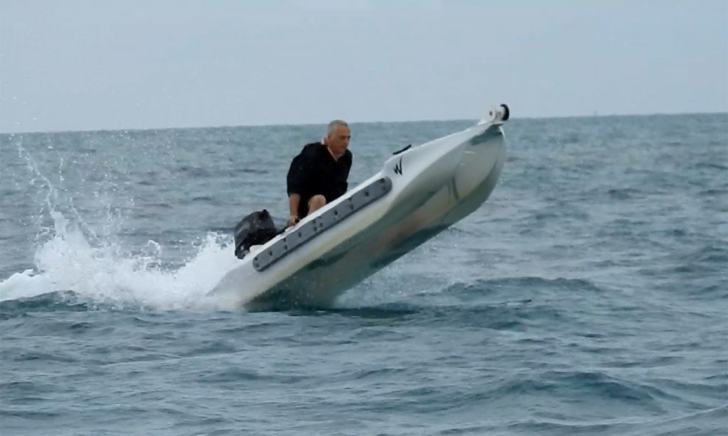 Wavewalk S4 “kayak” with 9.8 HP Tohatsu outboard motor, offshore, in ...